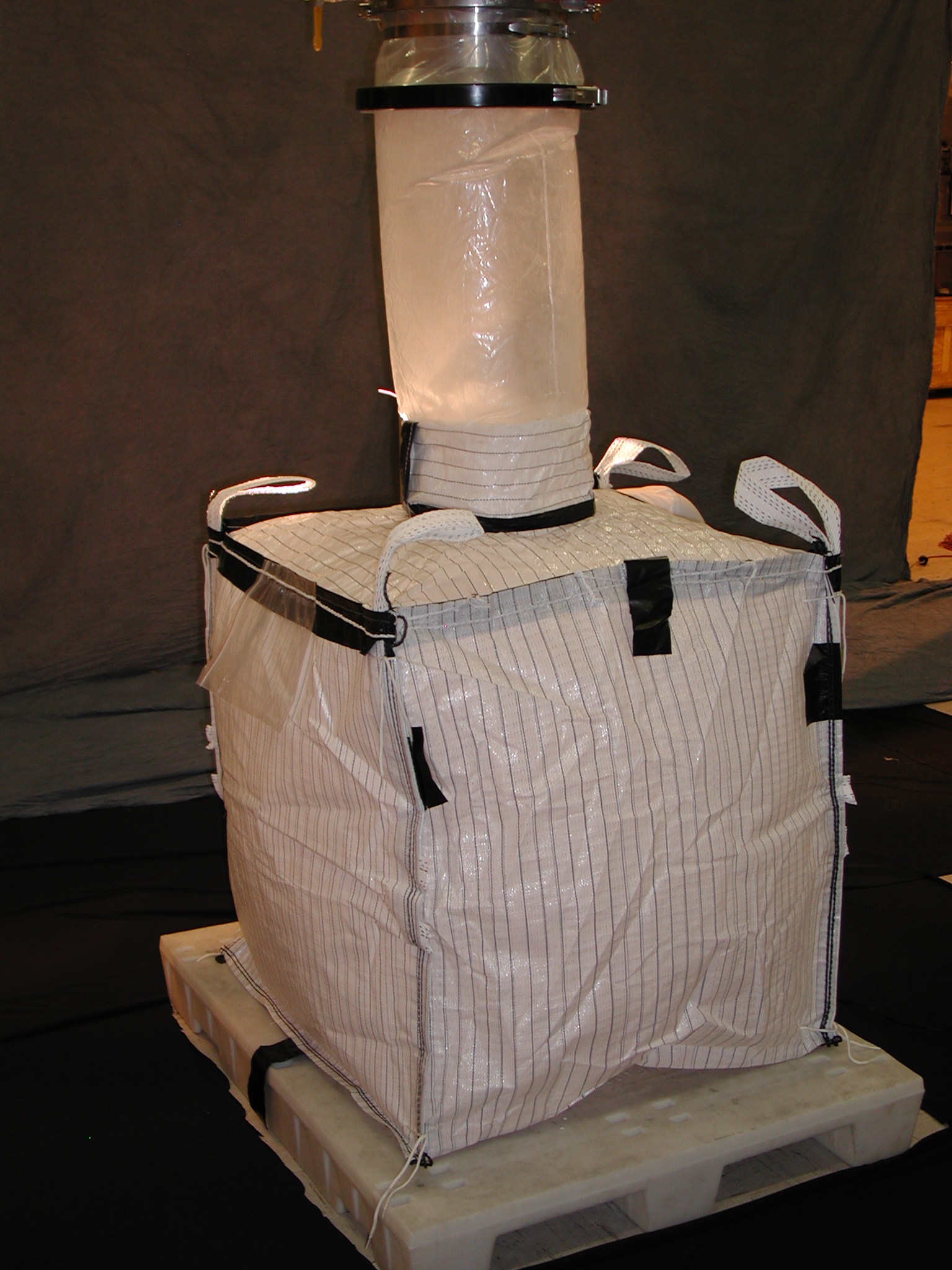 Flexible contained powder discharge into FIBC’s - Making.com